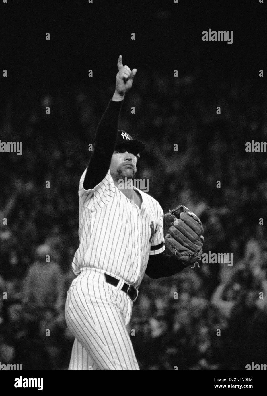 New York Yankees relief pitcher Goose Goosage gives the number one sign ...