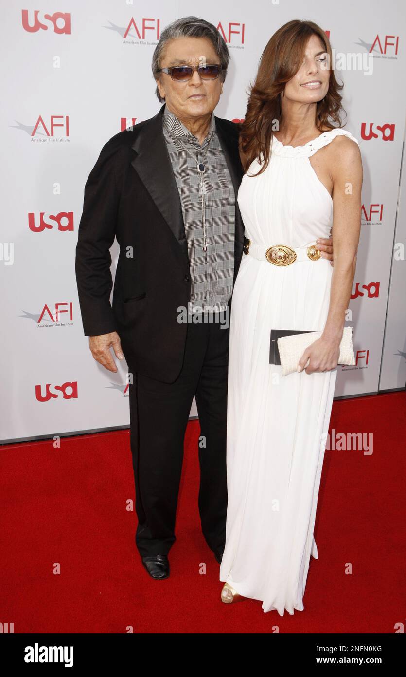 Producer Robert Evans and Victoria White arrive at the American Film ...