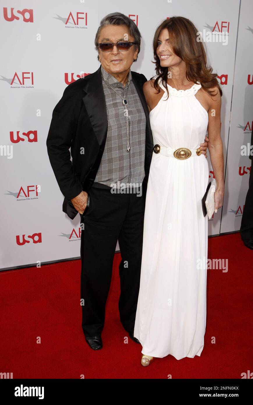 Producer Robert Evans and Victoria White arrive at the American Film ...