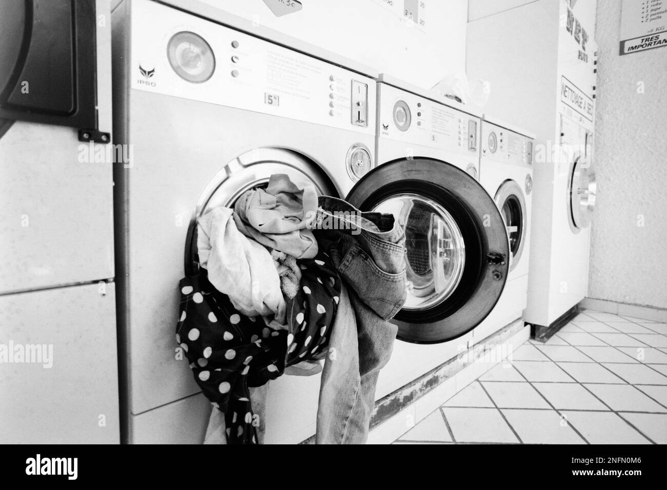Archives 90ies: A young unmarrried man washes clothes in an automatic ...