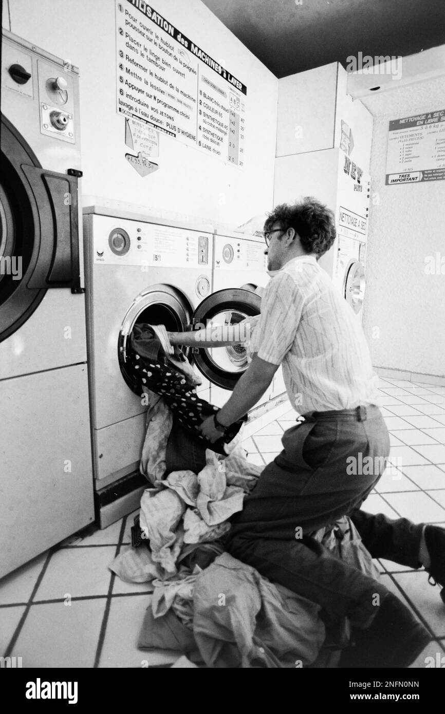 Archives 90ies: A young unmarrried man washes clothes in an automatic ...