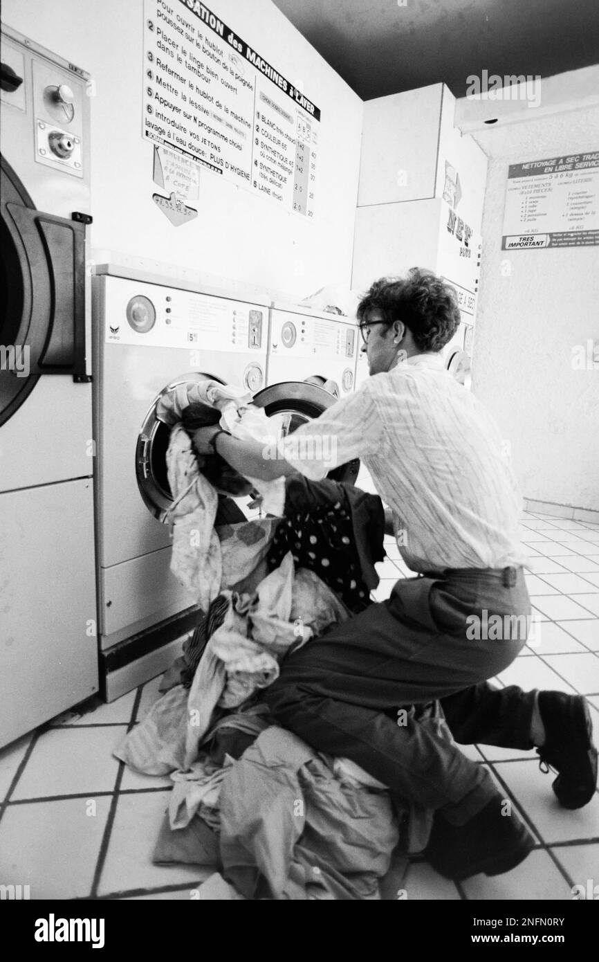 Archives 90ies: A young unmarrried man washes clothes in an automatic ...