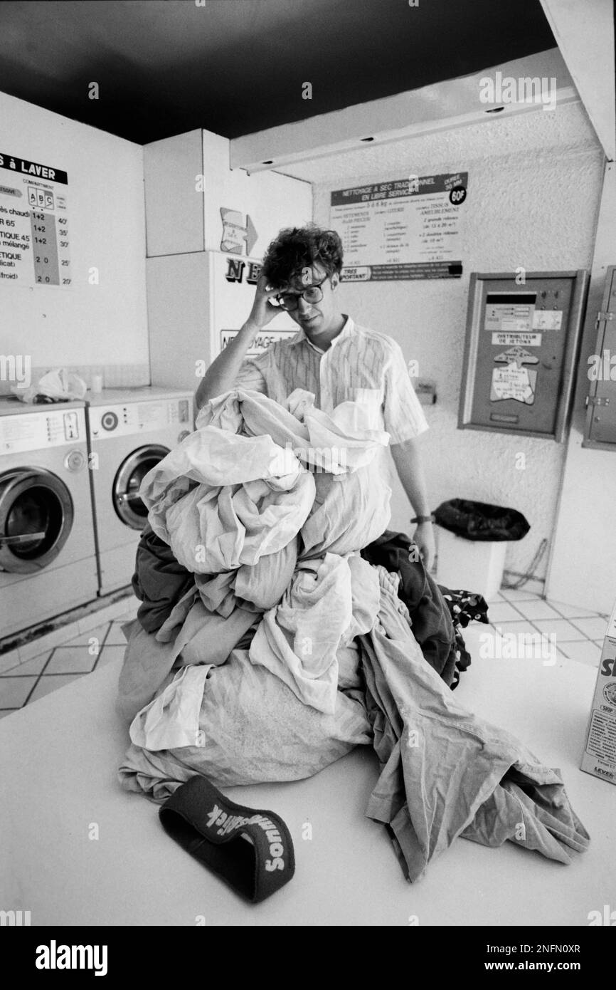 Archives 90ies: A young unmarrried man washes clothes in an automatic ...