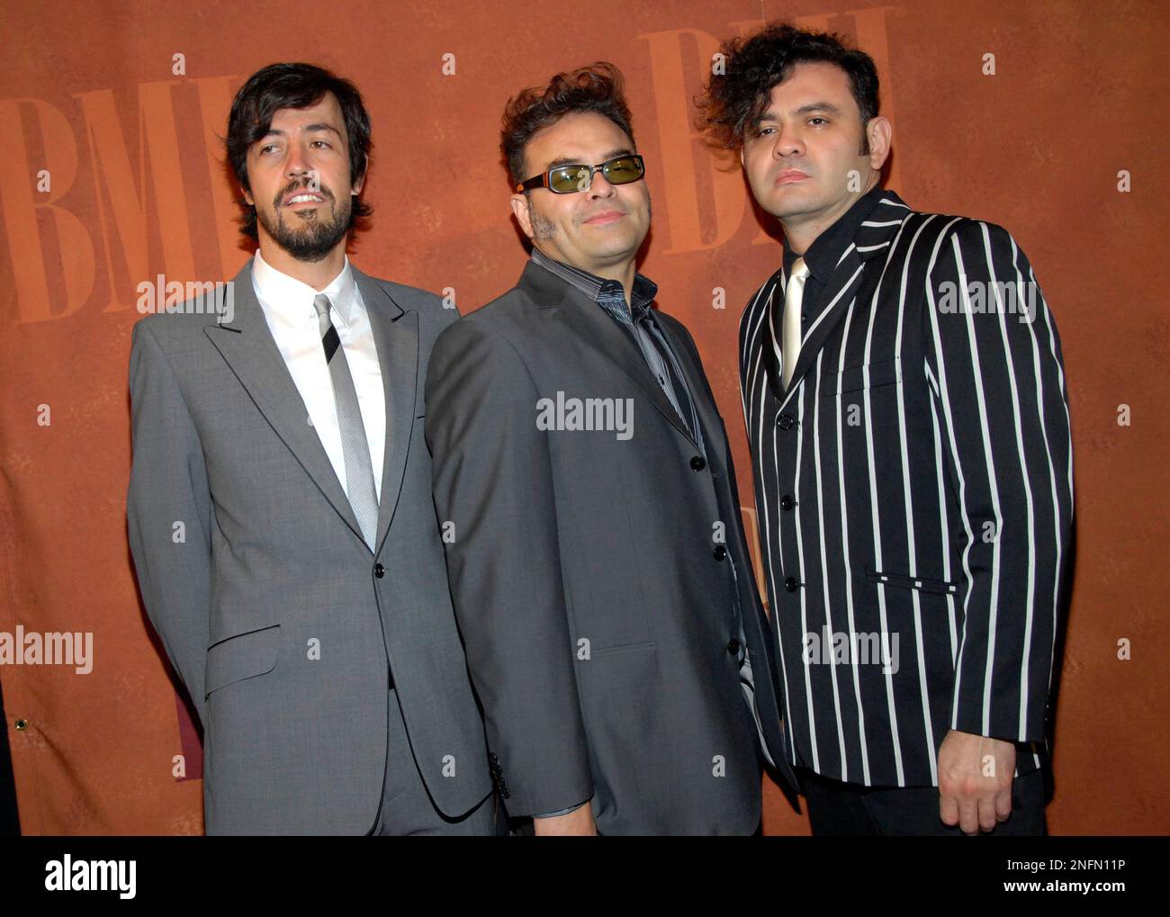 Members of the Mexican rock band Cafe Tacuba pose for photographers as ...