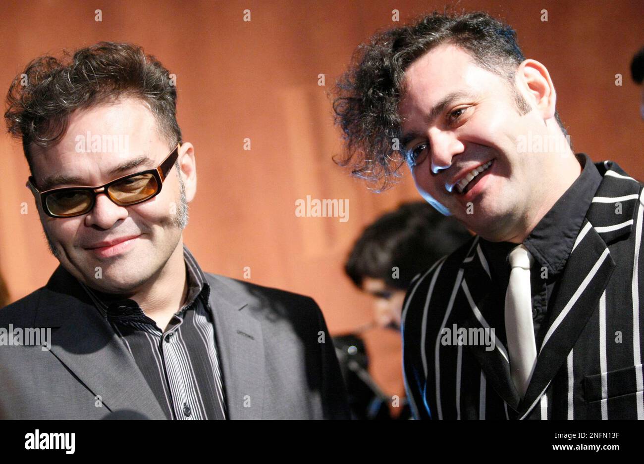 Members of the Mexican rock band Cafe Tacuba pose for photographers as ...