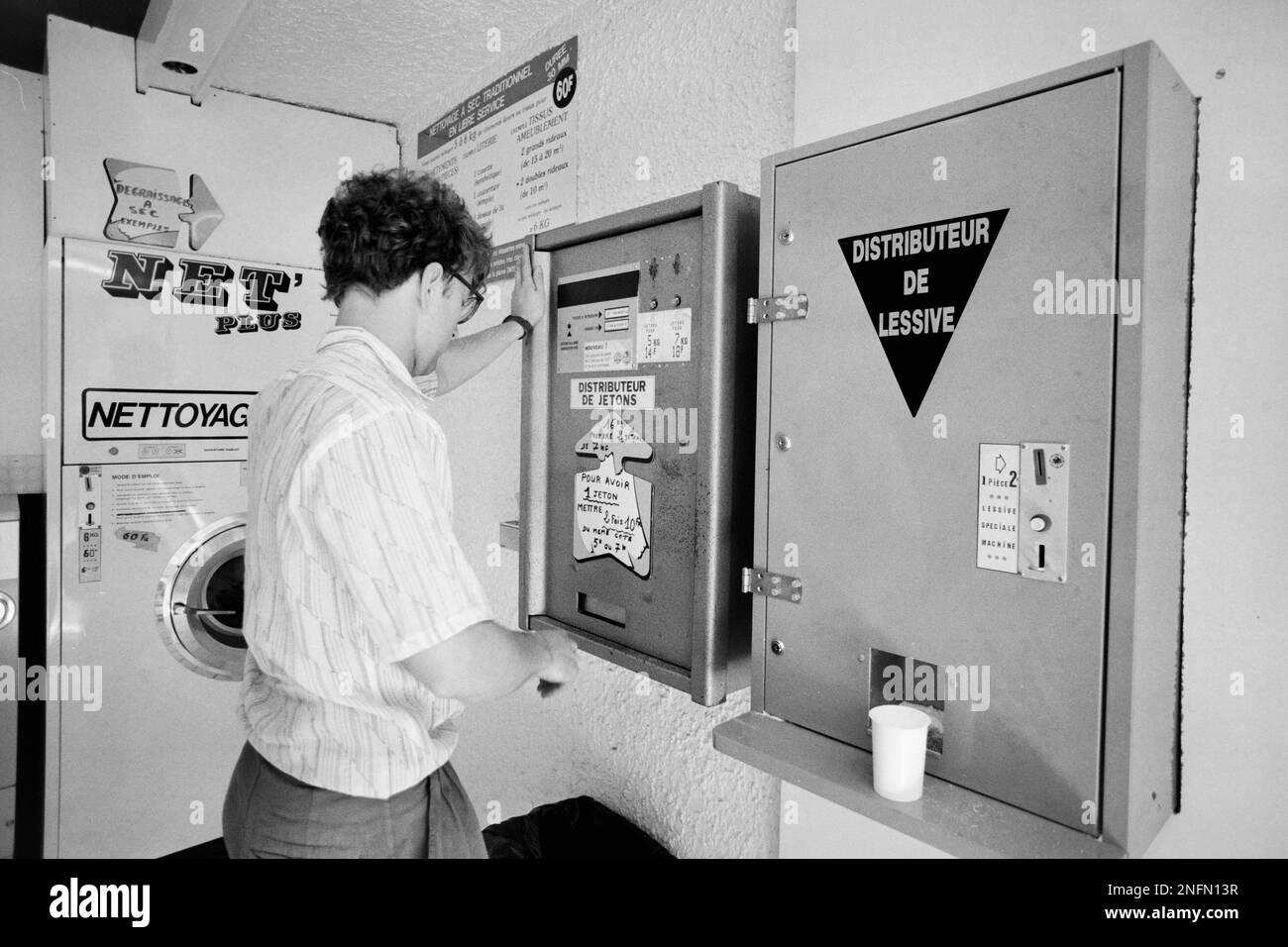 Archives 90ies: A young unmarrried man washes clothes in an automatic ...