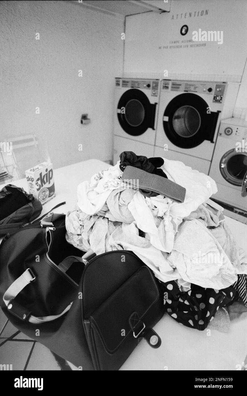 Archives 90ies: A young unmarrried man washes clothes in an automatic ...