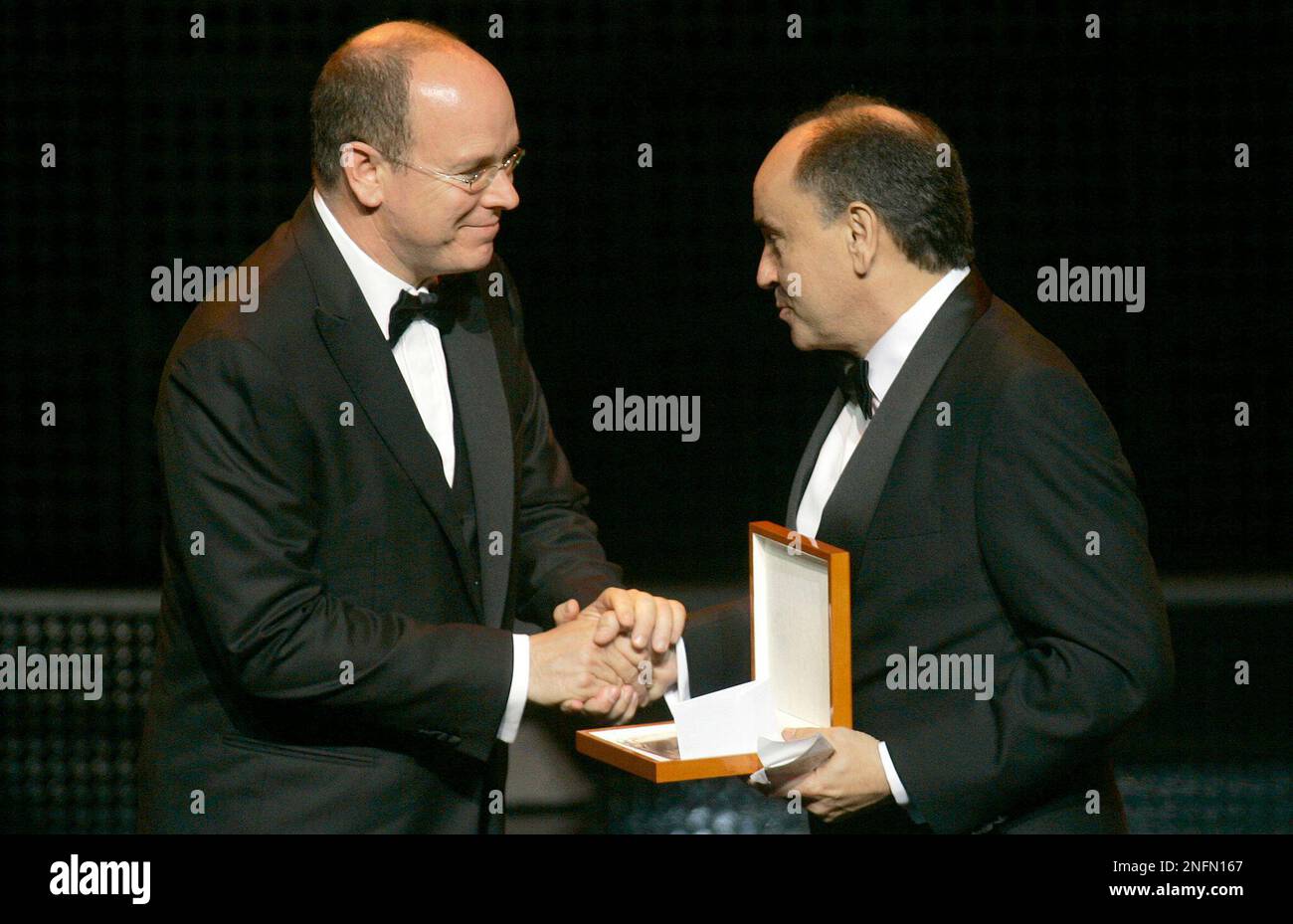 Prince Albert II of Monaco, left, and Spanish reporter Angel Navarro ...