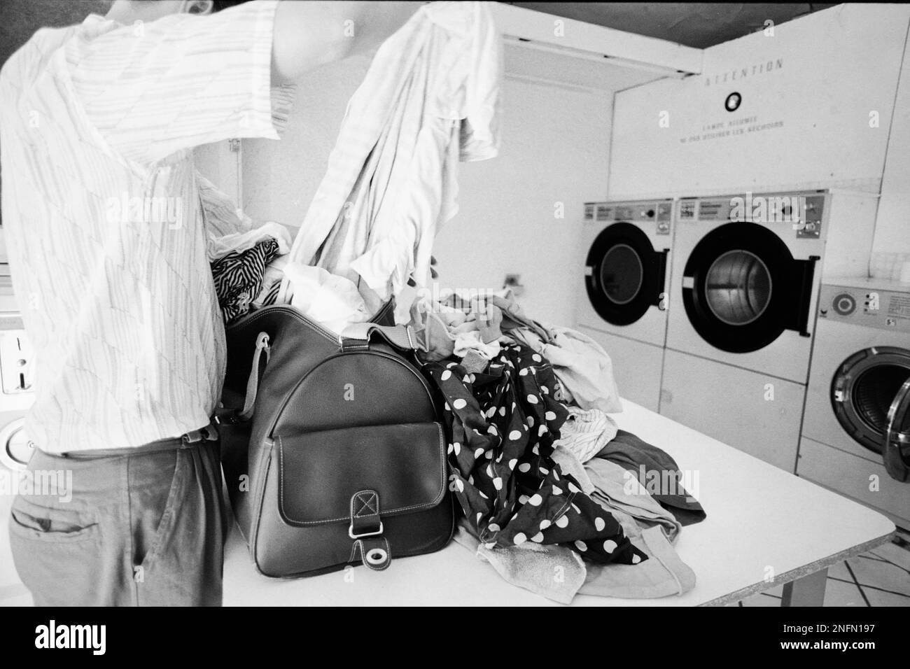 Archives 90ies: A young unmarrried man washes clothes in an automatic ...