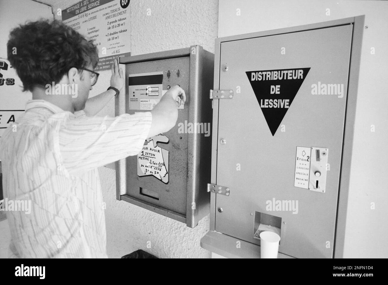 Archives 90ies: A young unmarrried man washes clothes in an automatic ...