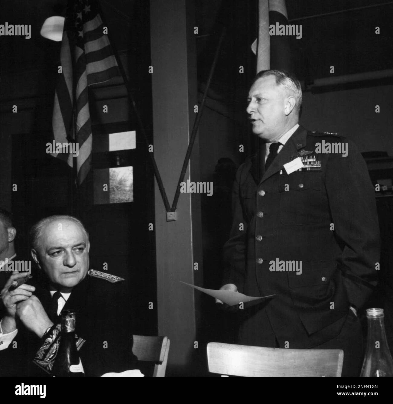 William H. Tunner, commander in chief of the USAFE, welcomes guests on ...