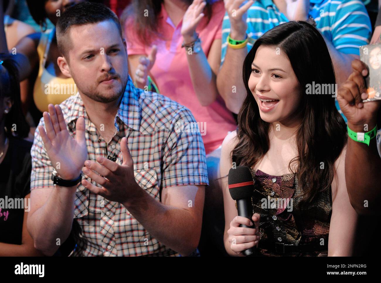 Actress / singer Miranda Cosgrove, right,talks with VJ Damien Fahey ...
