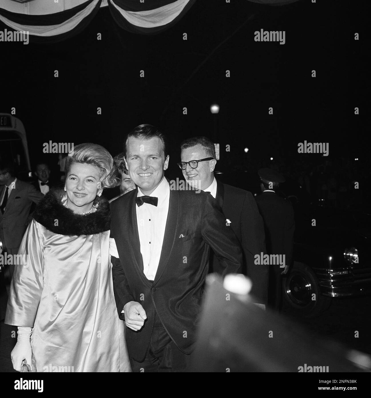 Actress Joan Fontaine with escort George Stevens, arrives on Sept. 25 ...