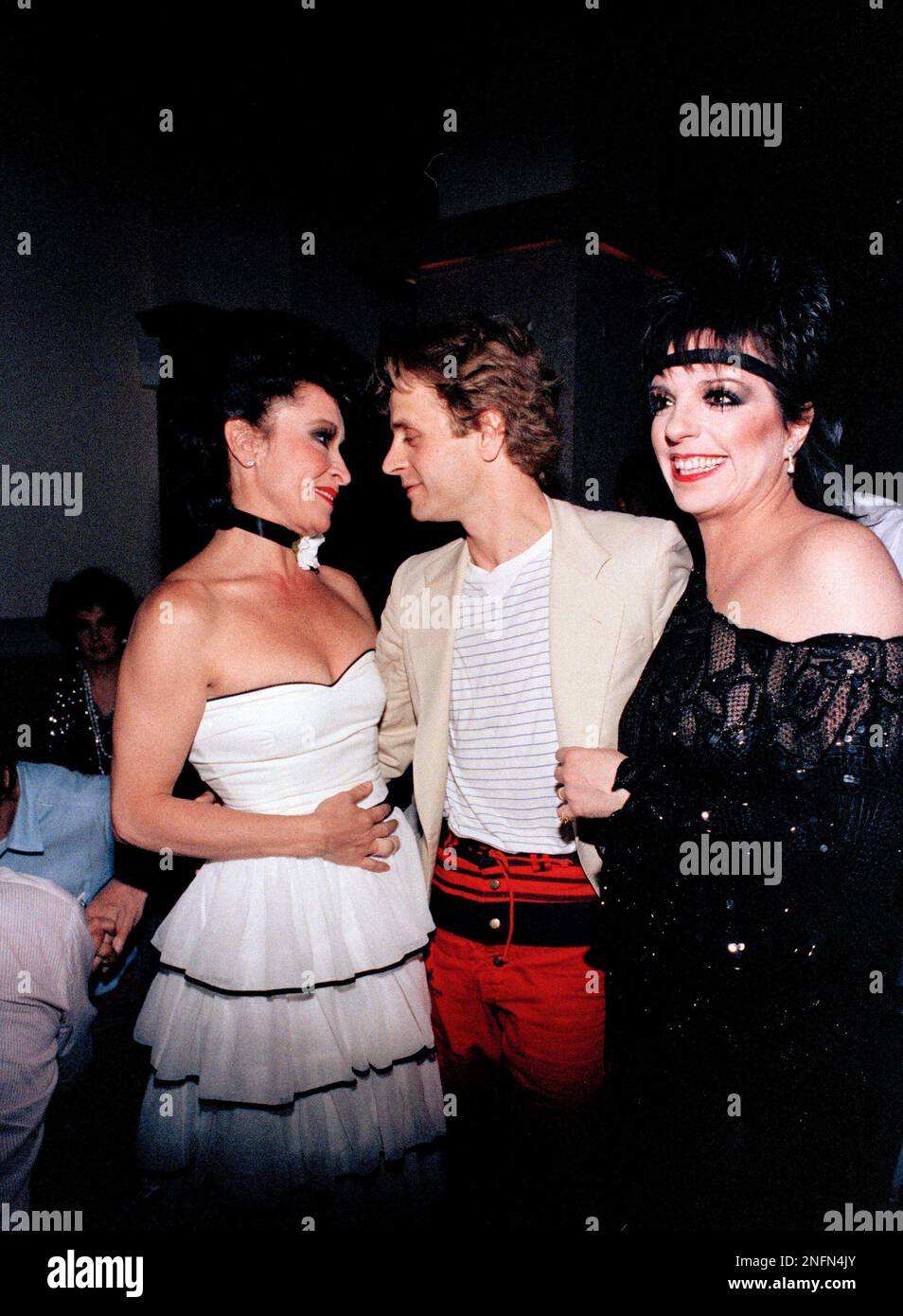 Actress Chita Rivera, left, and dancer Mikhail Baryshnikov embrace ...