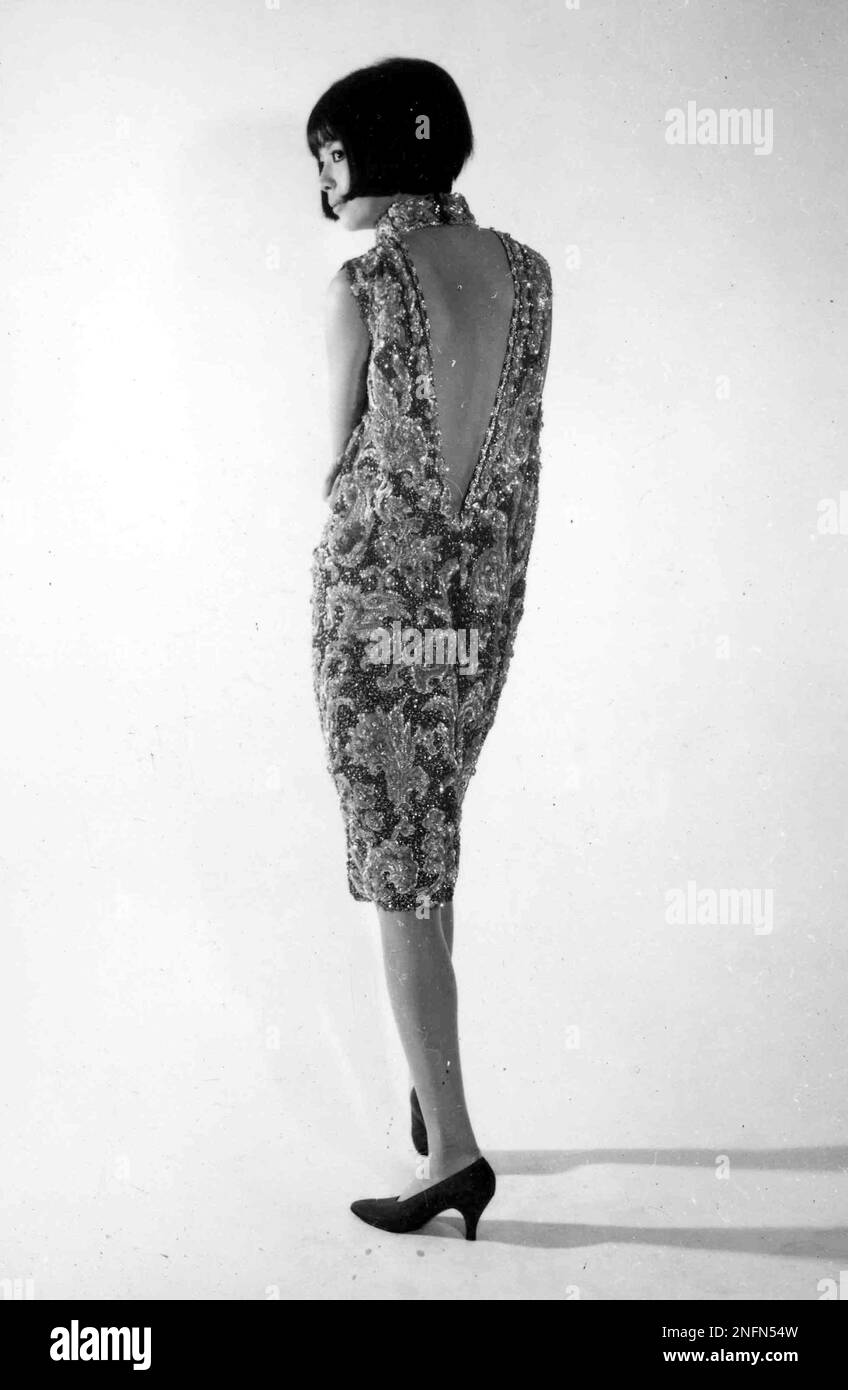 Japanese model Hiroko Matsumoto wears an afternoon dress with steep ...