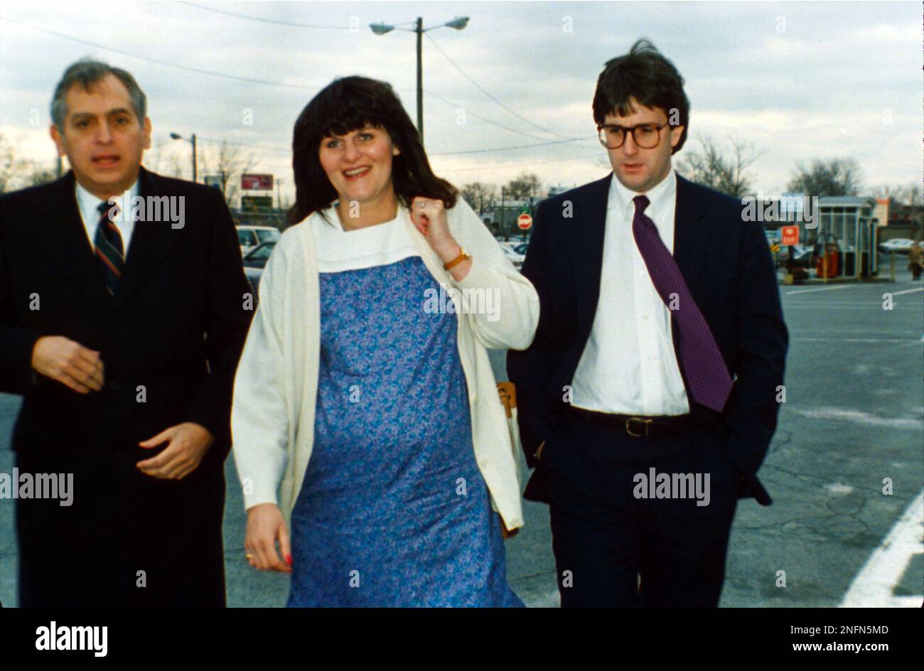 Surrogate mother Mary Beth Whitehead-Gould, center, and her husband ...