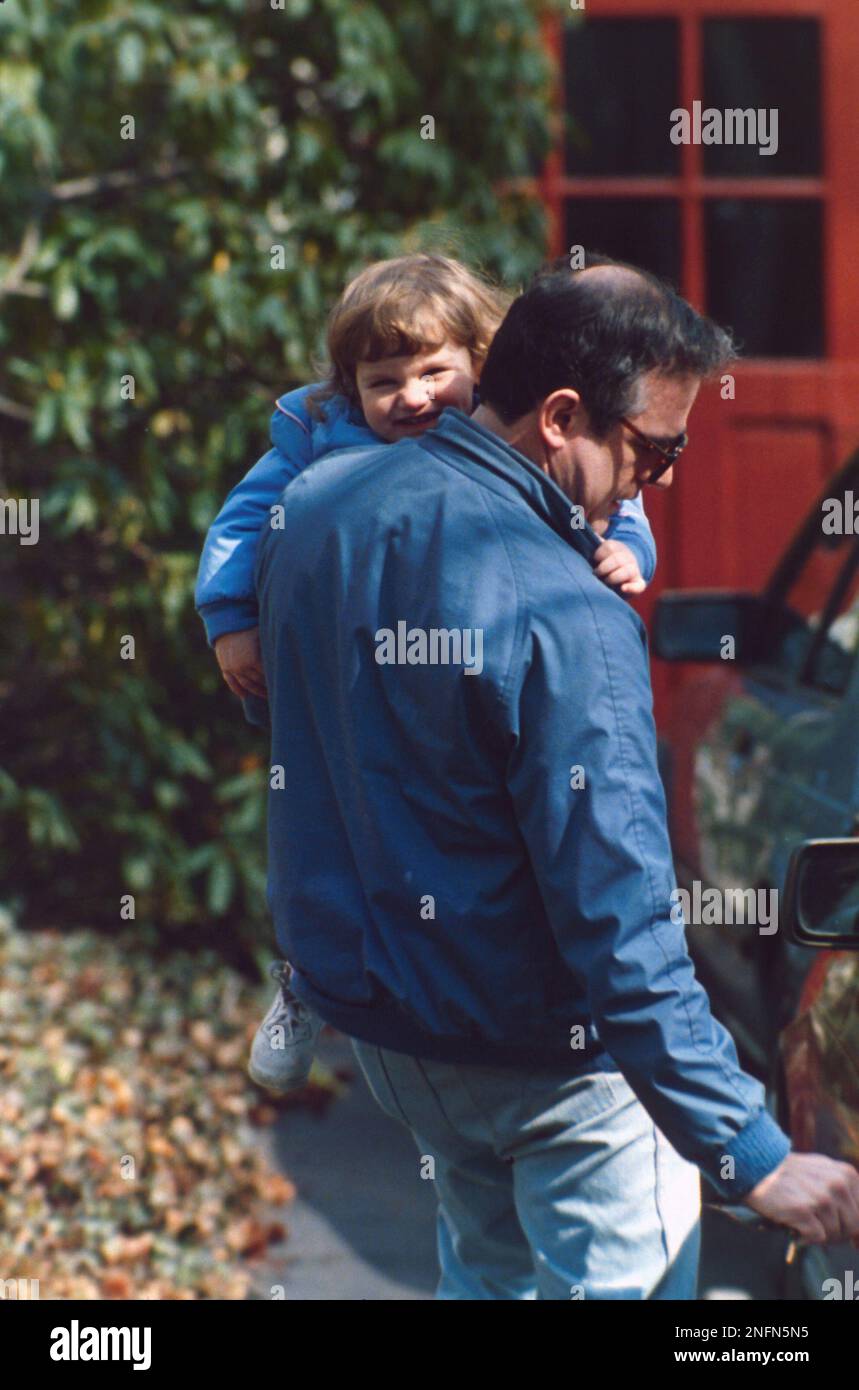 A smiling Melissa Stern in carried by her father, William Stern, from ...