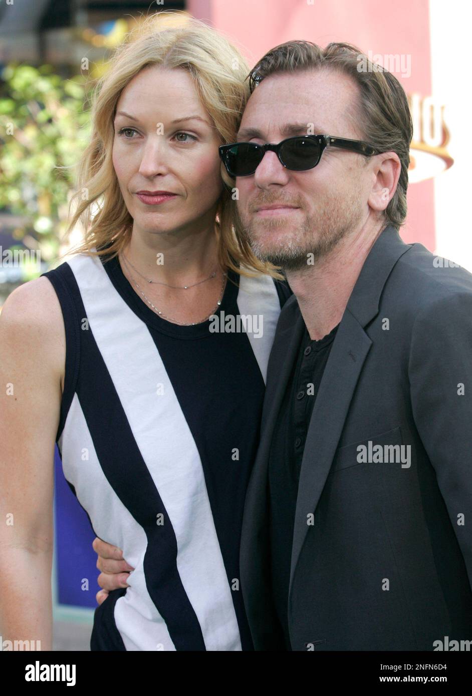 Actor Tim Roth, right, and his wife Nikki Butler pose on the press line ...