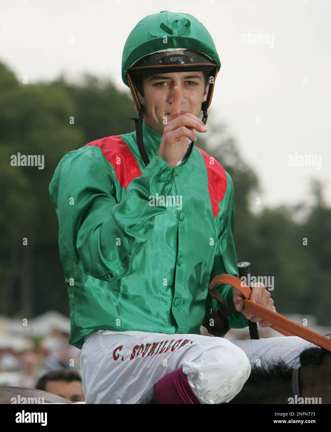 French jockey Christophe Soumillon, riding Zarkava, gestures to edias ...