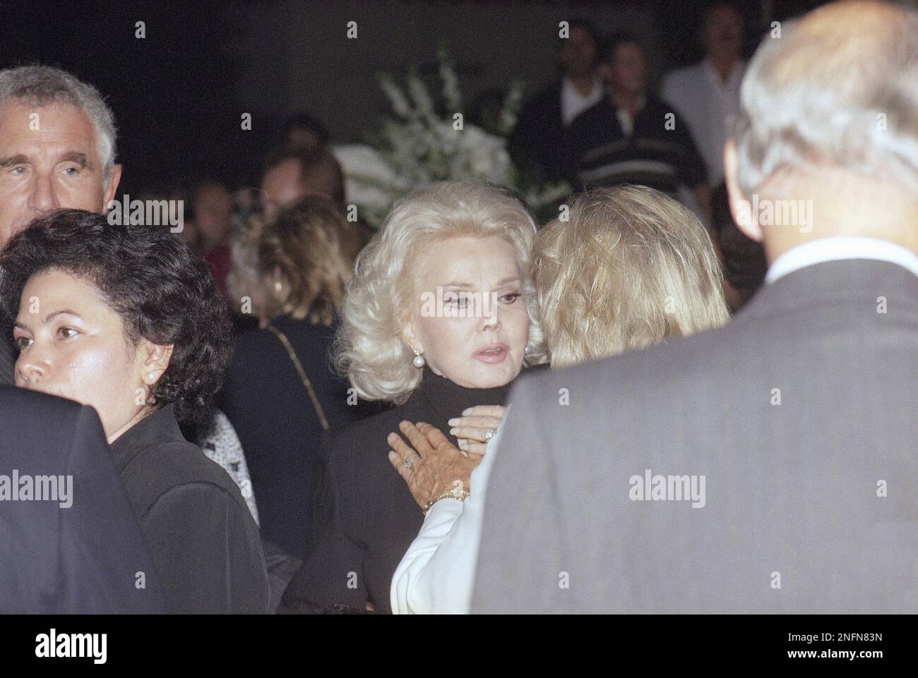 Zsa Zsa Gabor receives condolences from friends after a memorial ...