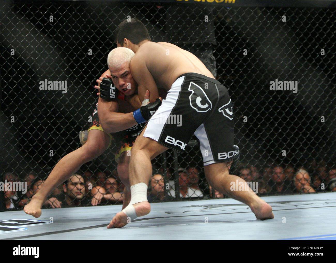 Lyoto Machida of Brazil, right, grapples with Tito Ortiz during their ...