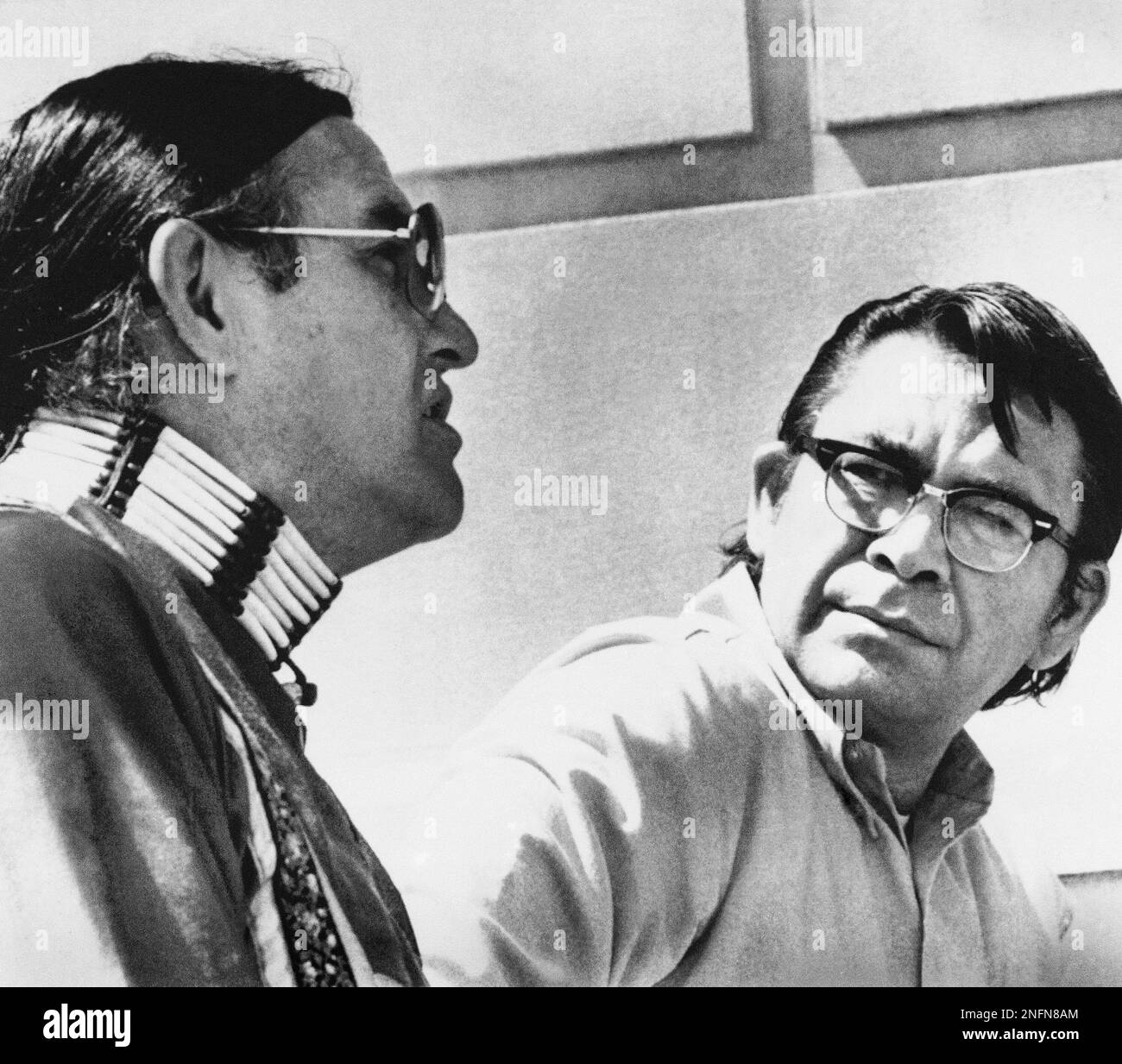 Vine Deloria, right, talks with Vernon Bellecourt on steps of Federal ...