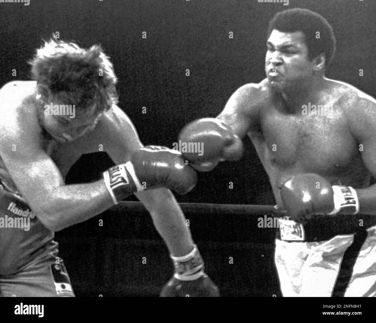 American heavyweight boxer Muhammad Ali, right, lands a blow to the jaw ...
