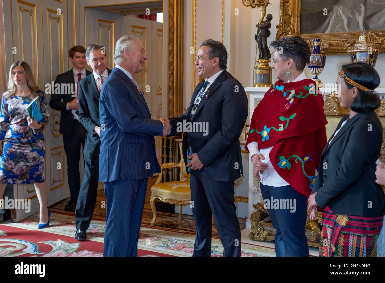 King Charles III (left), shakes hands with Canadian indigenous leaders ...