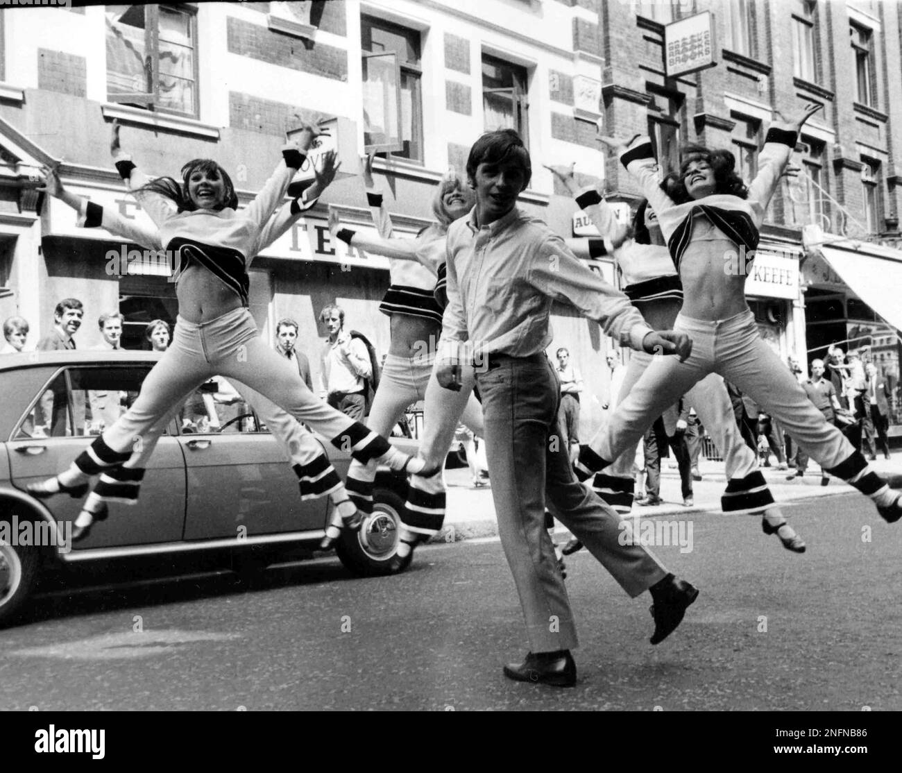 Pop singer and composer Georgie Fame with dance group called 'The Beat ...