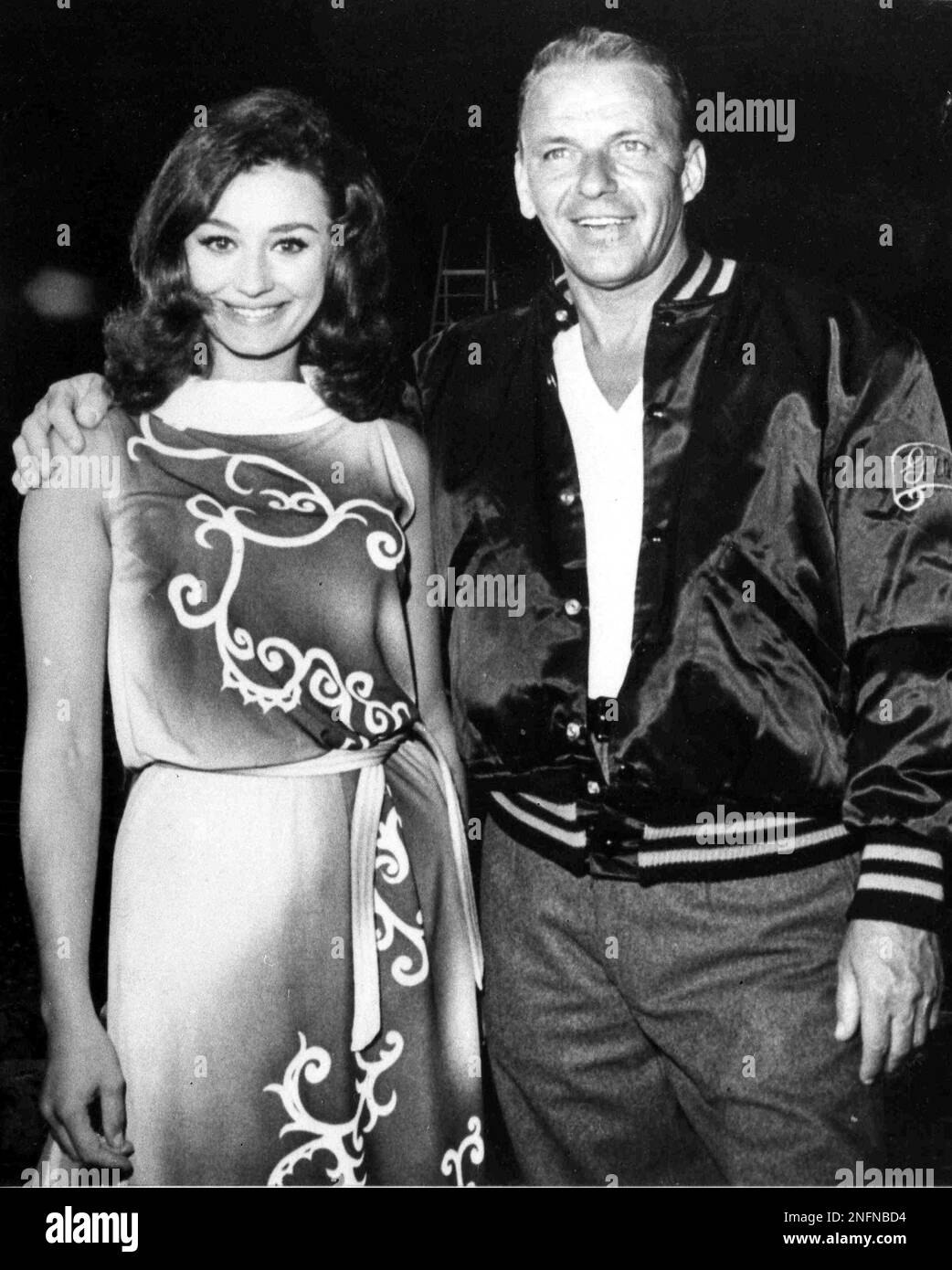 American film star and singer Frank Sinatra poses with Italian actress ...