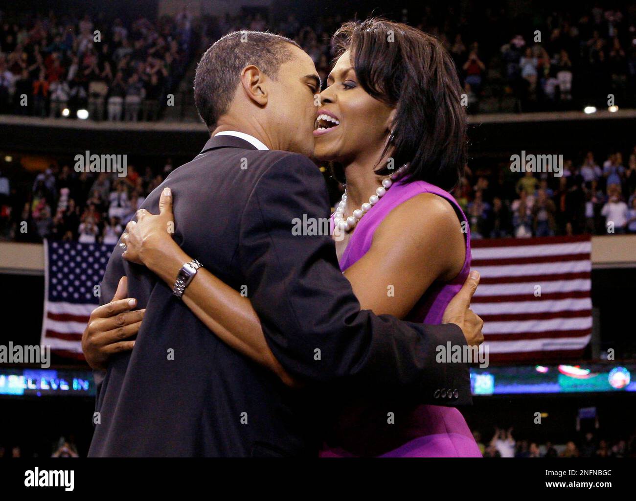 Democratic presidential hopeful, Sen. Barack Obama D-Ill. gets a hug ...