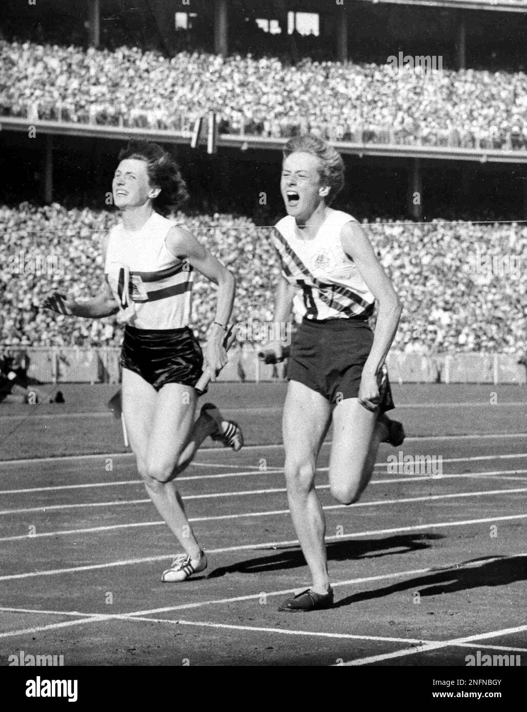 Australia's Betty Cuthbert, right, wins the Women's Olympic Games 4 x ...