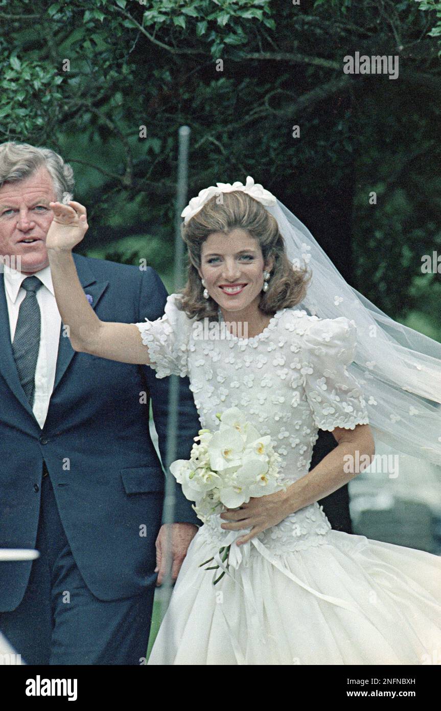 Caroline Kennedy waves during her wedding July 19, 1986. Her uncle Ted ...