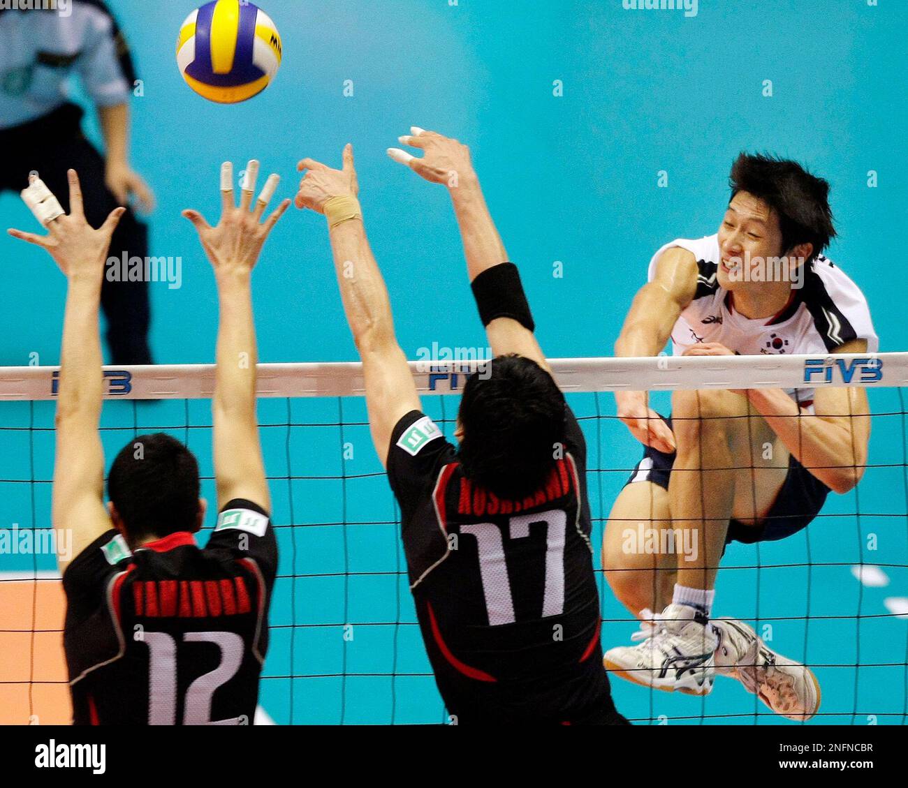 Moon Sung-min of South Korea, right, hits the ball against Kota ...