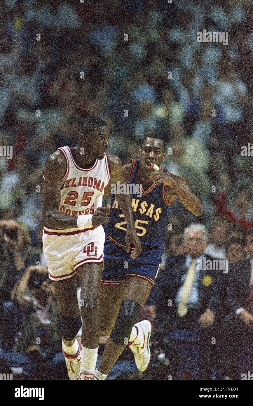 Danny Manning, right, gestures to Oklahoma's Harvey Grant after Manning ...