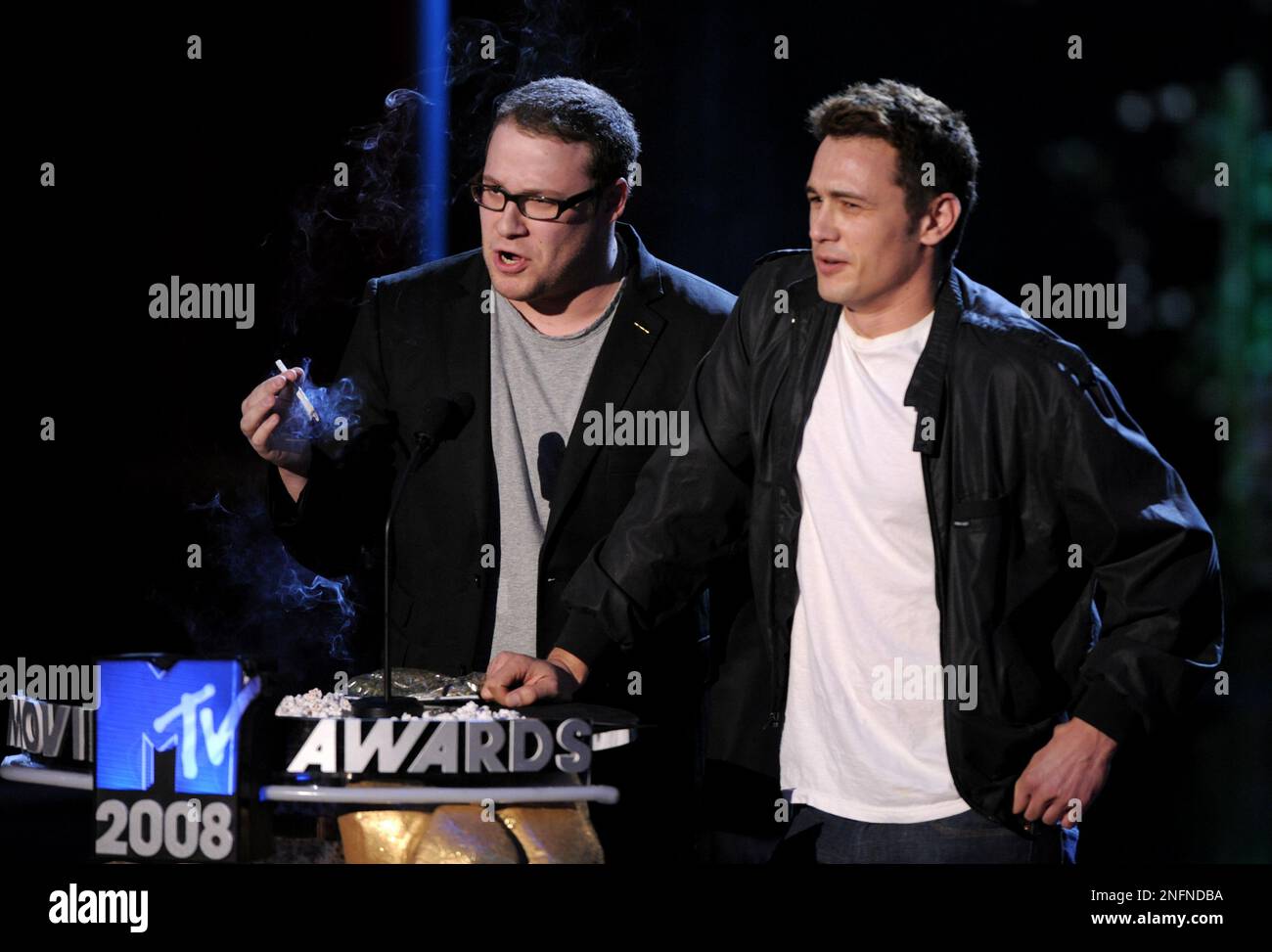 Seth Rogen, left, and James Franco present the award for best movie at ...