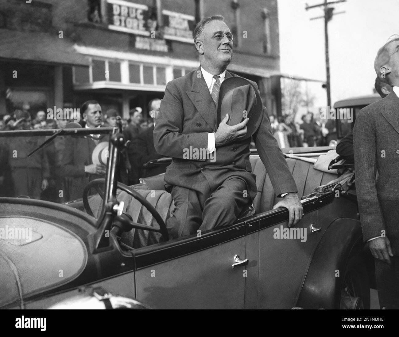 President Franklin D. Roosevelt salutes the flag during a flag-raising ...