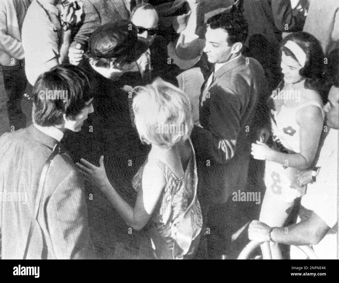 Beatles guitarists George harrison, left, and John Lennon, in leather ...