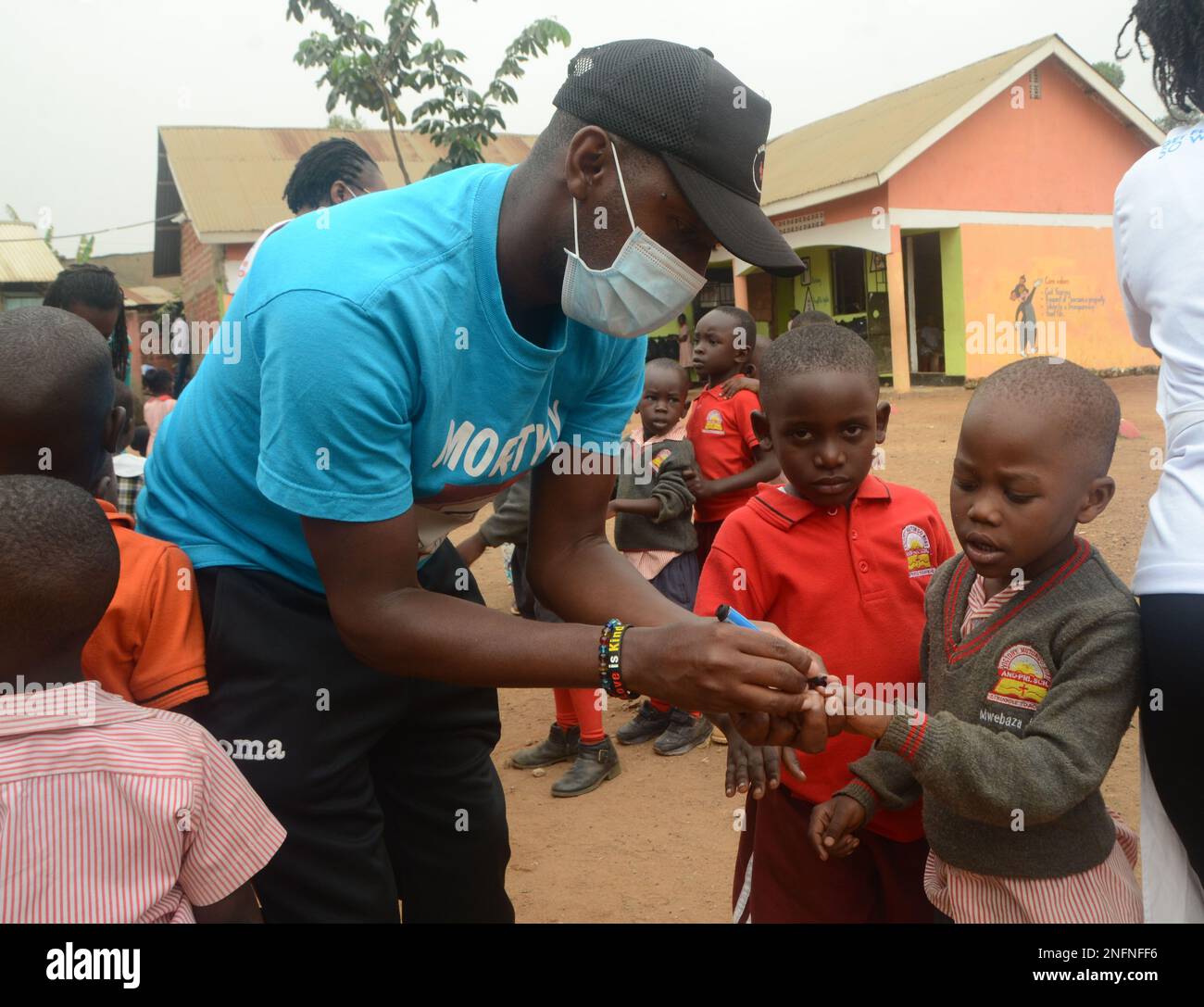 Kampala, Uganda. 17th Feb, 2023. A child's finger is marked after ...