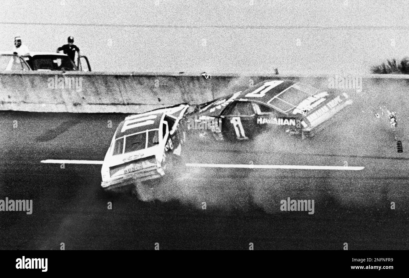 FILE - Donnie Allison (1) and Cale Yarborough (11) crash on the last ...
