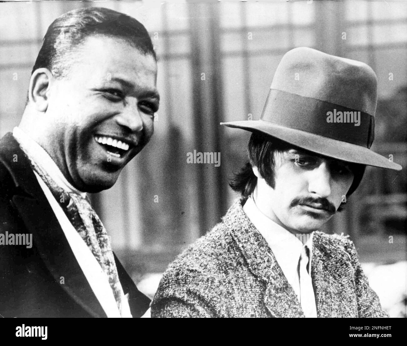 Former American boxing champion Sugar Ray Robinson, left, and Ringo ...