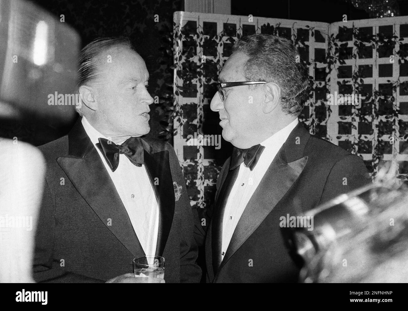 Bob Hope, left, talks with Dr. Henry Kissinger on May 3, 1980 at a ...