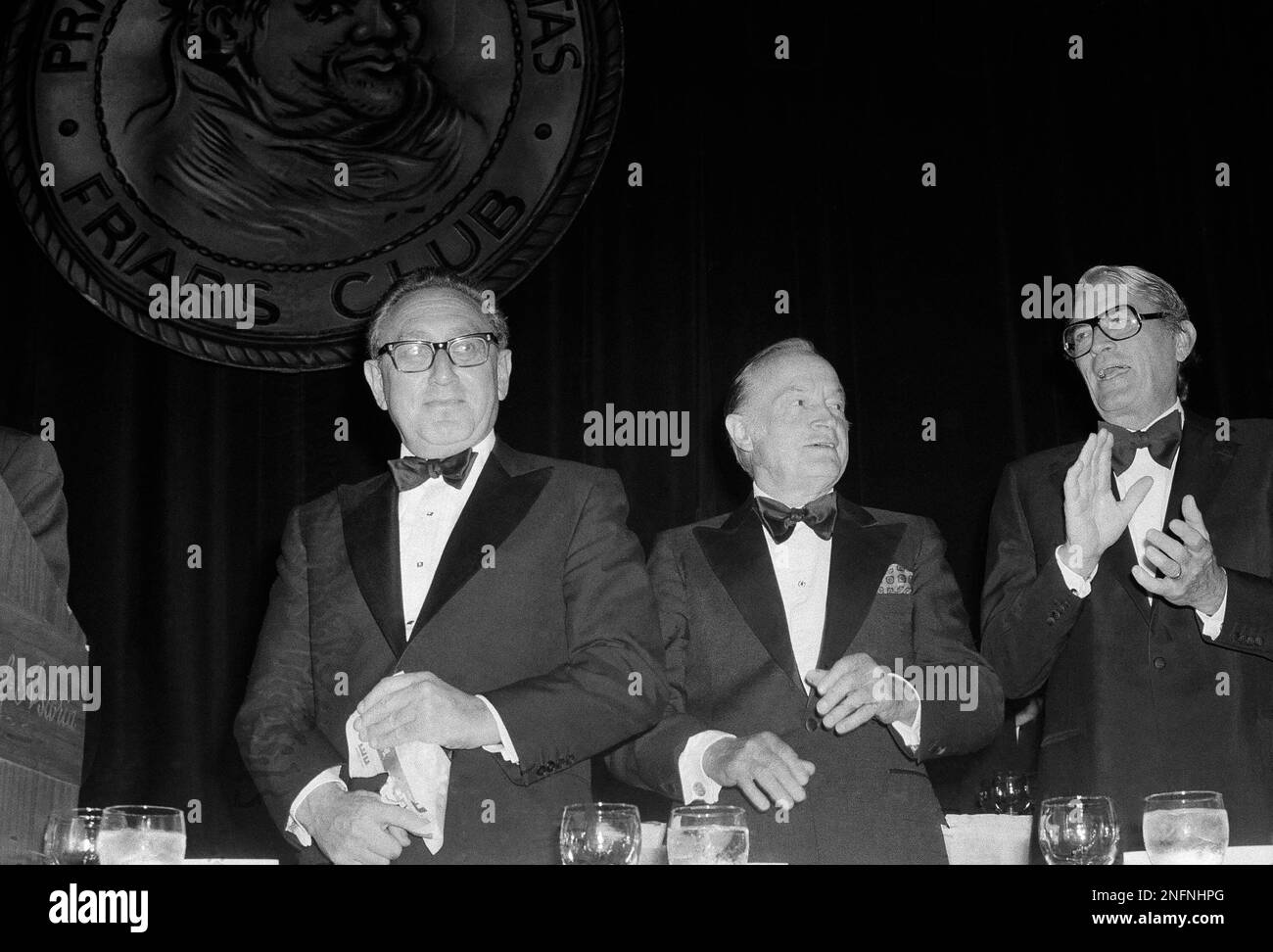 Dr. Henry Kissinger, left, joins Bob Hope and Gregory Peck at a dinner ...