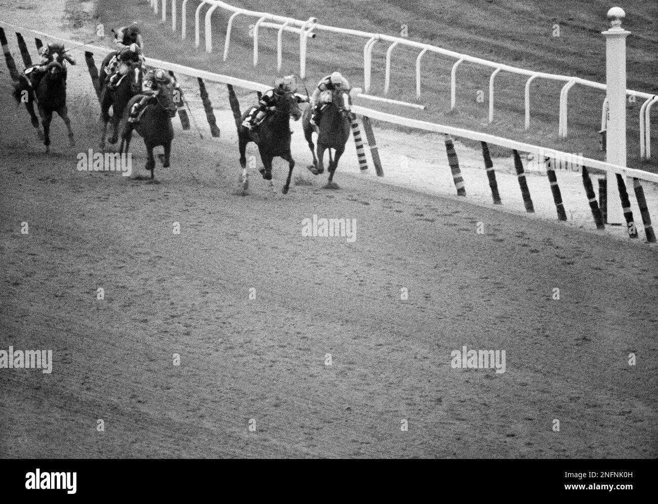 Coastal, with jockey Ruben Hernandez in light cap riding, starts to ...