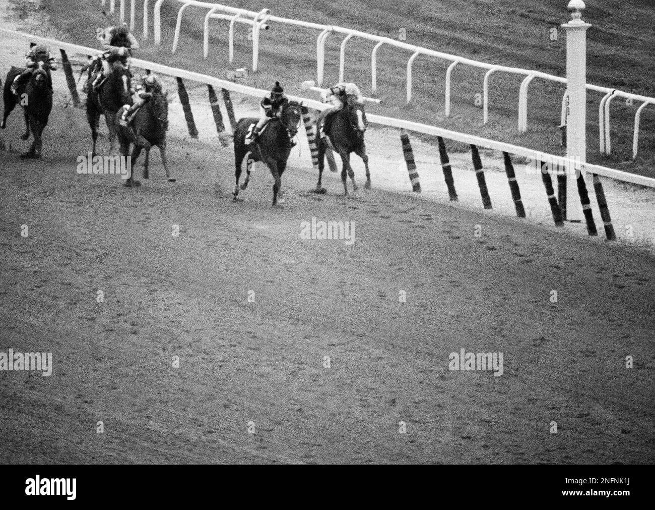 Coastal, with jockey Ruben Hernandez in light cap riding, starts to ...