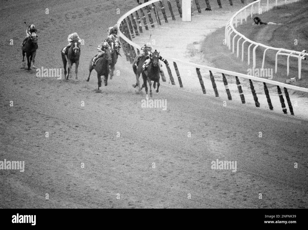 Coastal, with jockey Ruben Hernandez in light cap riding, starts to ...