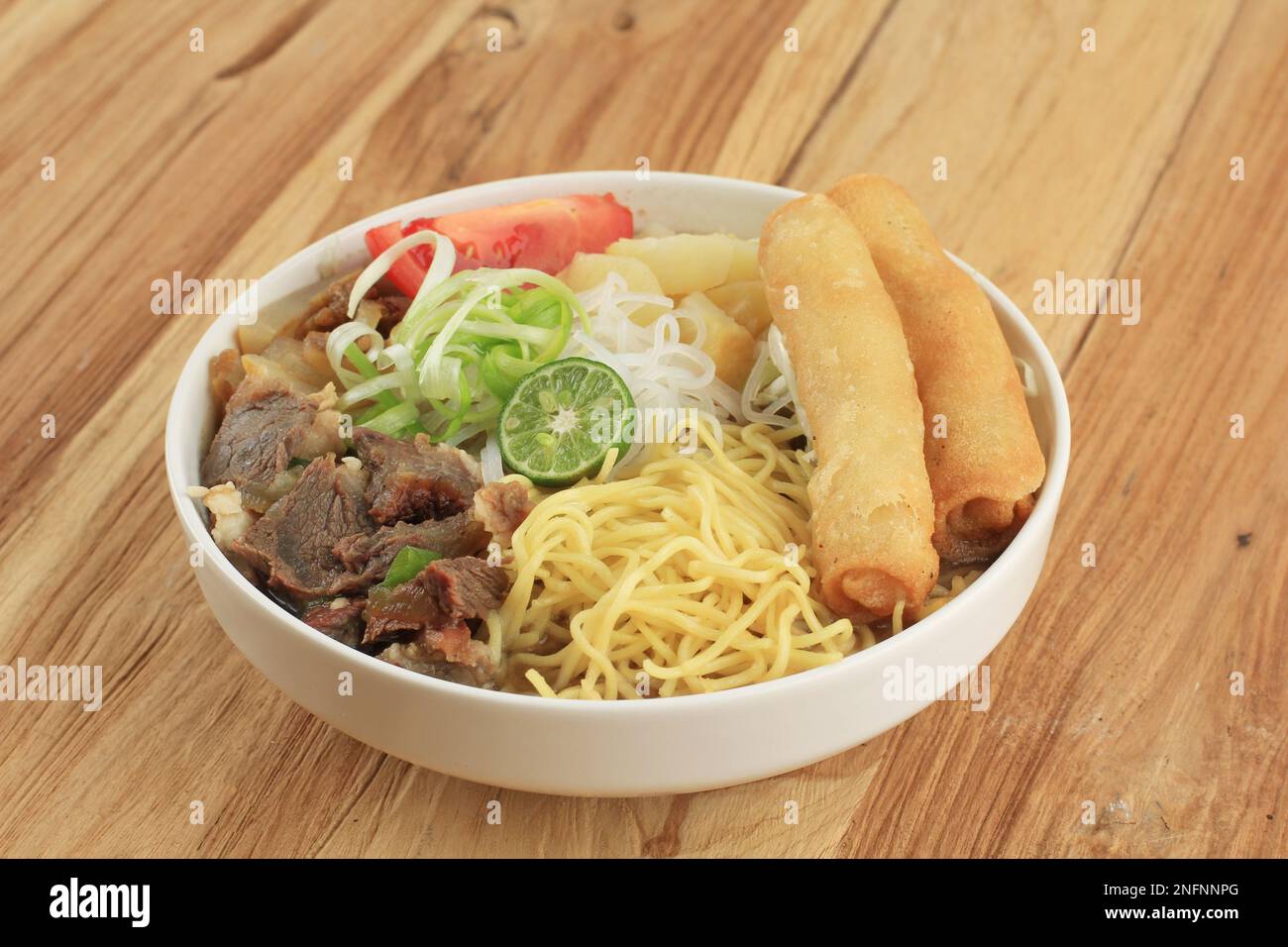 Soto Mie Bogor. Traditional Sundanese Beef Noodle Soup with Spring Roll ...