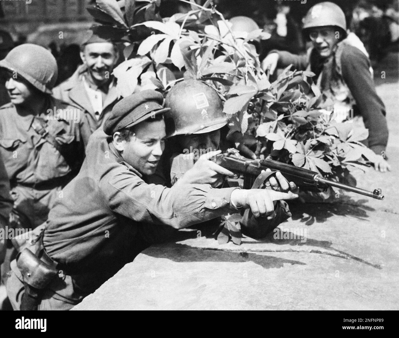 Orie Dekker of Passaic, N.J. gives a lesson to a Russian soldier during ...