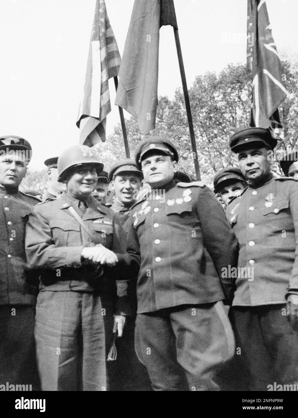 Maj. Gen. Emil F. Reinhardt, second from left, commanding officer of ...