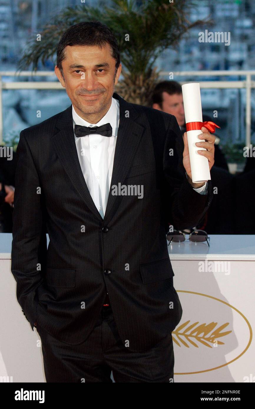 Turkish director Nuri Bilge Ceylan poses with the Best Director award ...